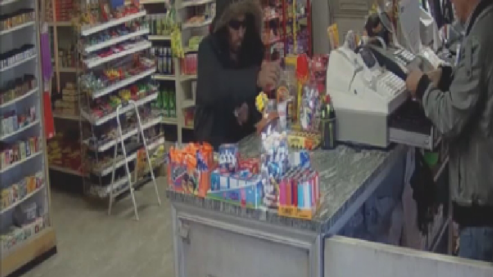 Surveillance video shows armed robbery, store owner offers reward | KOKH Surveillance video shows armed robbery, store owner offers reward | KOKH
